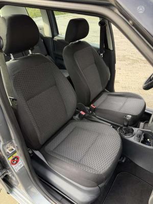 Grey Skoda Roomster 2013 in Vilnius, with an engine capacity of 1.60 L and mileage of 289 thousand km for 2990 €, photo 13 on AUTOMOTO.COM.LV