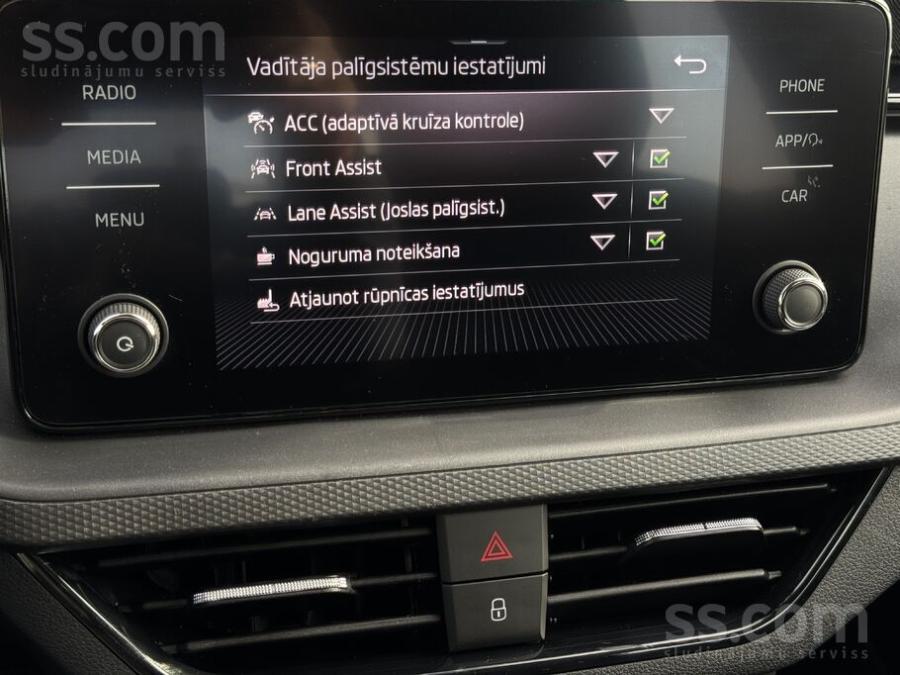 Black Skoda Scala 2021 in Valmiera, with an engine capacity of 1.00 L and mileage of 118 thousand km for 11900 €, photo 18 on AUTOMOTO.COM.LV