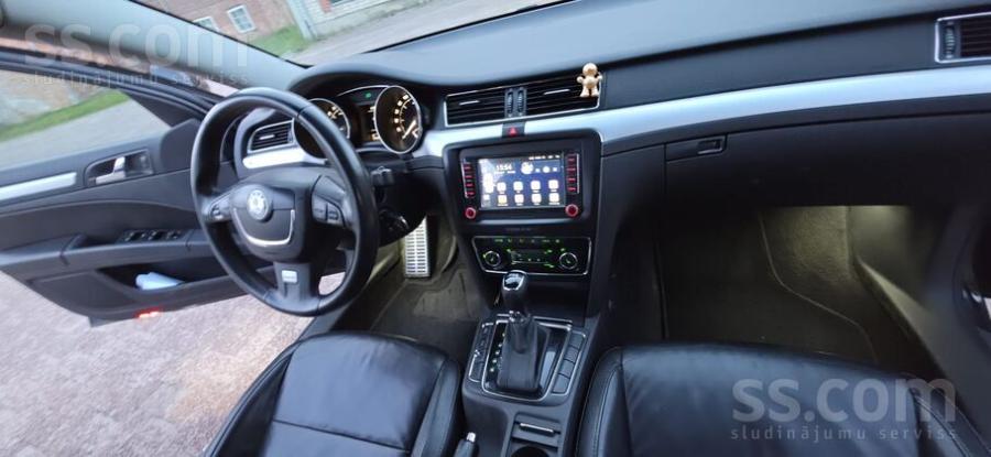 Black Skoda SuperB 2013 in Kuldiga, with an engine capacity of 2.00 L and mileage of 340 thousand km for 3999 €, photo 24 on AUTOMOTO.COM.LV