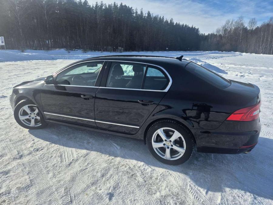 Black Skoda SuperB 2015 in Vilnius, with an engine capacity of 1.80 L and mileage of 98 thousand km for 8200 €, photo 1 on AUTOMOTO.COM.LV