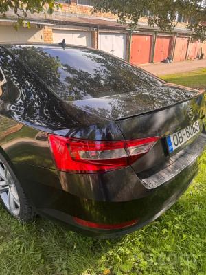 Black Skoda SuperB 2017 in Riga, with an engine capacity of 1.60 L and mileage of 335 thousand km for 10980 €, photo 6 on AUTOMOTO.COM.LV