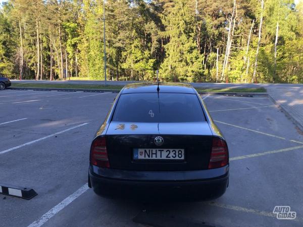 Black Skoda SuperB 2004 in Klaipeda, with an engine capacity of 1.90 L and mileage of 240 thousand km for 1500 €, photo 6 on AUTOMOTO.COM.LV