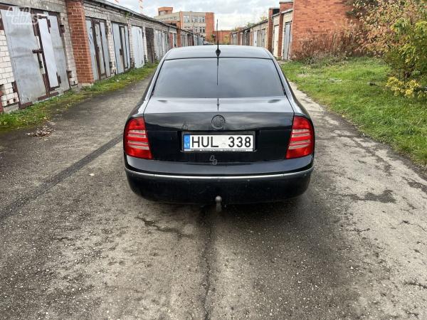 Melns Skoda SuperB 2004 Panevēža, ar dzinēja tilpumu 2.50 L un nobraukumu 300 tūkst. km par 500 €, foto 7 vietnē AUTOMOTO.COM.LV