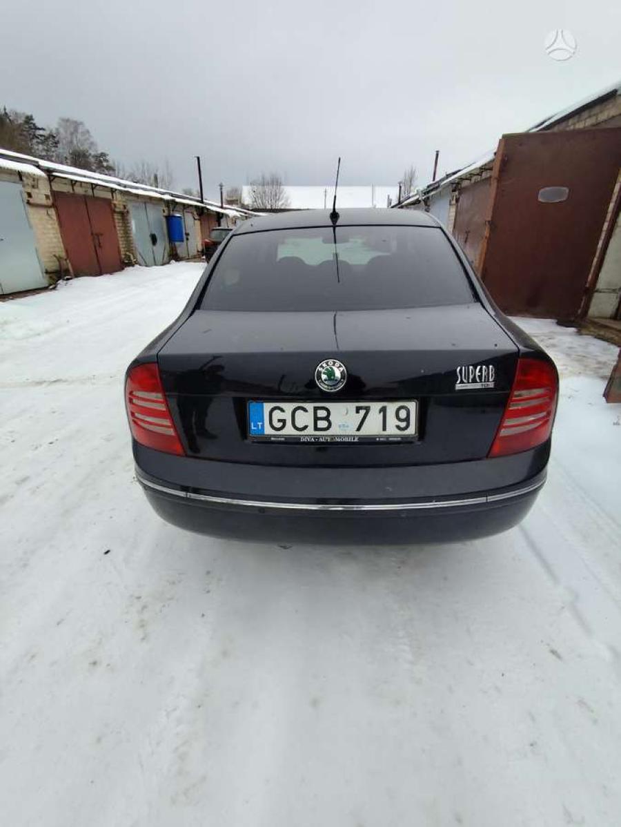 Black Skoda SuperB 2006 in Ukmerge, with an engine capacity of 1.97 L and mileage of 301 thousand km for 1400 €, photo 3 on AUTOMOTO.COM.LV