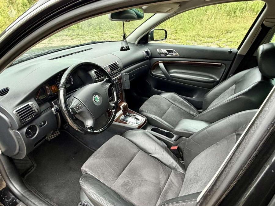 Black Skoda SuperB 2006 in Vilnius, with an engine capacity of 2.50 L and mileage of 175 thousand km for 2100 €, photo 12 on AUTOMOTO.COM.LV