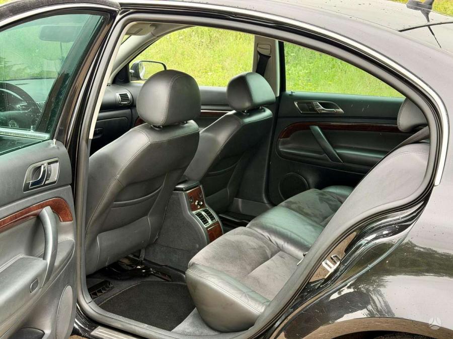 Black Skoda SuperB 2006 in Vilnius, with an engine capacity of 2.50 L and mileage of 175 thousand km for 2100 €, photo 13 on AUTOMOTO.COM.LV