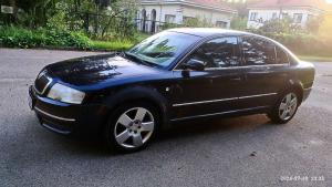 Melns Skoda SuperB 2006 Kauņa, ar dzinēja tilpumu 1.97 L un nobraukumu 314 tūkst. km par 1600 €, foto  vietnē AUTOMOTO.COM.LV