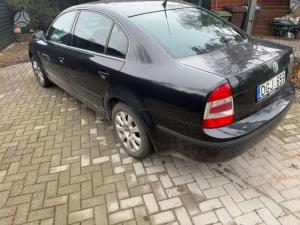 Black Skoda SuperB 2007 in Vilnius, with an engine capacity of 2.77 L and mileage of 126 thousand km for 2350 €, photo 13 on AUTOMOTO.COM.LV