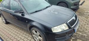 Black Skoda SuperB 2007 in Riga, with an engine capacity of 2.50 L and mileage of 304 thousand km for 1200 €, photo  on AUTOMOTO.COM.LV