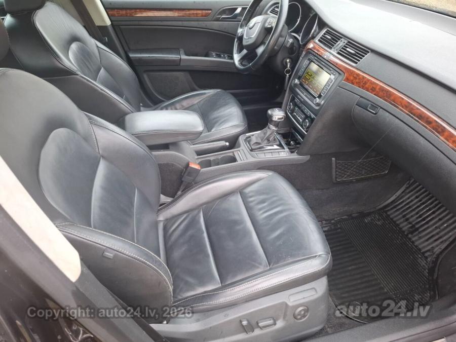 Black Skoda SuperB 2010 in Tartu, with an engine capacity of 2.00 L and mileage of 261 thousand km for 4499 €, photo 13 on AUTOMOTO.COM.LV