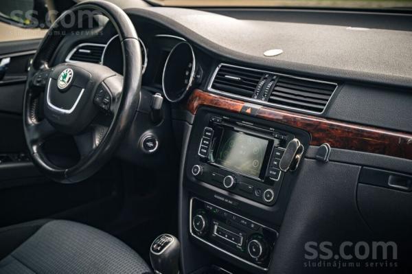 Black Skoda SuperB 2013 in Riga, with an engine capacity of 2.00 L and mileage of 0 thousand km for 3990 €, photo 9 on AUTOMOTO.COM.LV