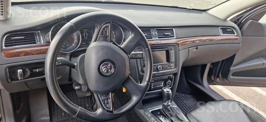 Black Skoda SuperB 2014 in Riga, with an engine capacity of 2.00 L and mileage of 275 thousand km for 5500 €, photo 9 on AUTOMOTO.COM.LV