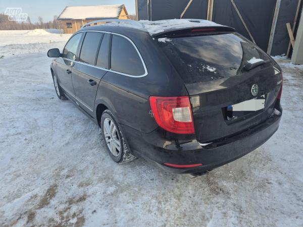 Black Skoda SuperB 2010 in Klaipeda, with an engine capacity of 1.80 L and mileage of 195 thousand km for 4500 €, photo 4 on AUTOMOTO.COM.LV