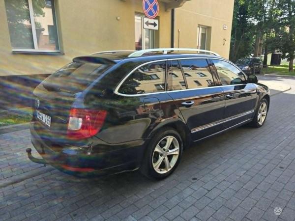 Black Skoda SuperB 2010 in Klaipeda, with an engine capacity of 1.97 L and mileage of 480 thousand km for 3250 €, photo 5 on AUTOMOTO.COM.LV