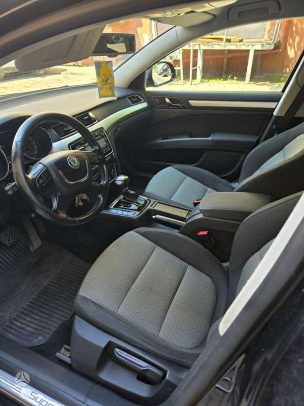 Black Skoda SuperB 2010 in Klaipeda, with an engine capacity of 1.97 L and mileage of 480 thousand km for 3250 €, photo 10 on AUTOMOTO.COM.LV