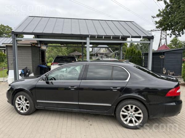 Black Skoda SuperB 2010 in Riga, with an engine capacity of 2.00 L and mileage of 417 thousand km for 3300 €, photo 1 on AUTOMOTO.COM.LV