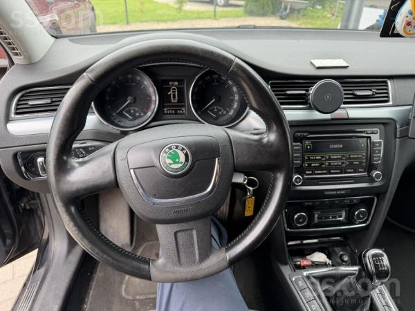 Black Skoda SuperB 2010 in Riga, with an engine capacity of 2.00 L and mileage of 417 thousand km for 3300 €, photo 8 on AUTOMOTO.COM.LV