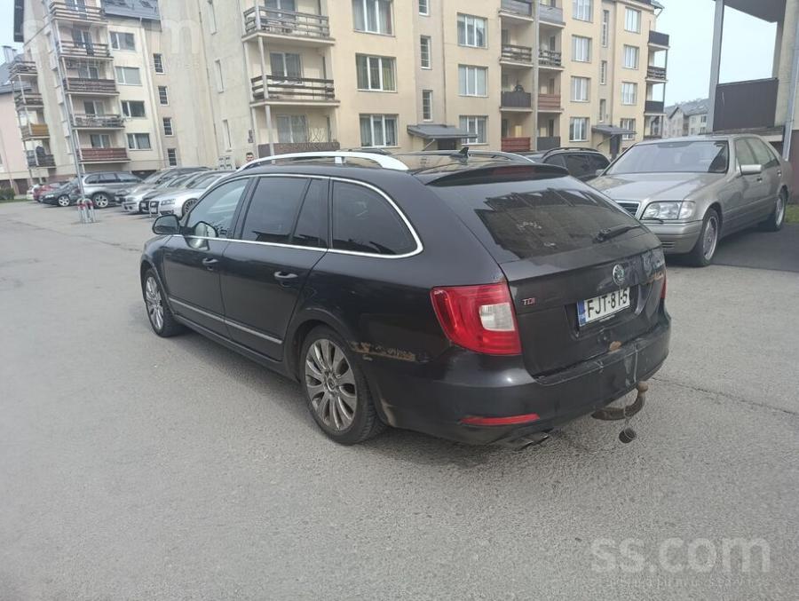 Black Skoda SuperB 2010 in Riga, with an engine capacity of 2.00 L and mileage of 0 thousand km for 1800 €, photo 5 on AUTOMOTO.COM.LV