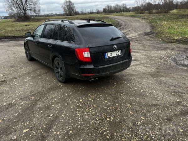Black Skoda SuperB 2011 in Riga, with an engine capacity of 2.00 L and mileage of 389 thousand km for 3900 €, photo 6 on AUTOMOTO.COM.LV
