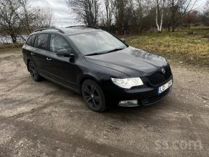 Black Skoda SuperB 2011 in Riga, with an engine capacity of 2.00 L and mileage of 389 thousand km for 3900 €, photo 7 on AUTOMOTO.COM.LV