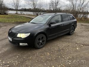 Black Skoda SuperB 2011 in Riga, with an engine capacity of 2.00 L and mileage of 389 thousand km for 3900 €, photo 8 on AUTOMOTO.COM.LV