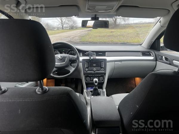 Black Skoda SuperB 2011 in Riga, with an engine capacity of 2.00 L and mileage of 389 thousand km for 3900 €, photo 3 on AUTOMOTO.COM.LV