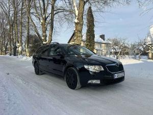 Black Skoda SuperB 2011 in Vilnius, with an engine capacity of 1.97 L and mileage of 235 thousand km for 4550 €, photo  on AUTOMOTO.COM.LV