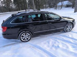 Black Skoda SuperB 2011 in Kaunas, with an engine capacity of 2.00 L and mileage of 257 thousand km for 6995 €, photo 13 on AUTOMOTO.COM.LV