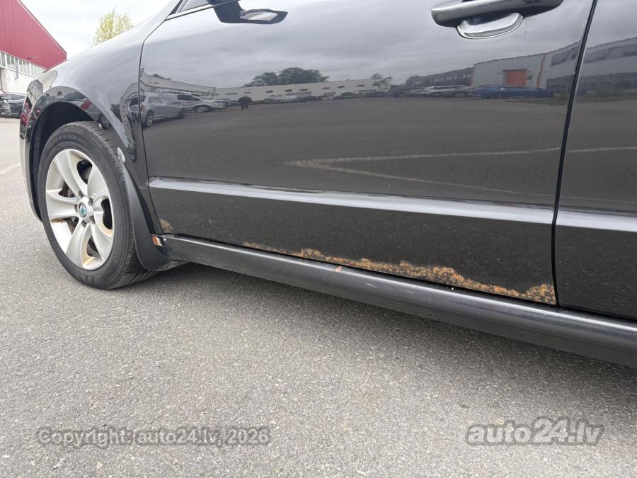Black Skoda SuperB 2011 in Tallinn, with an engine capacity of 1.80 L and mileage of 267 thousand km for 2900 €, photo 6 on AUTOMOTO.COM.LV