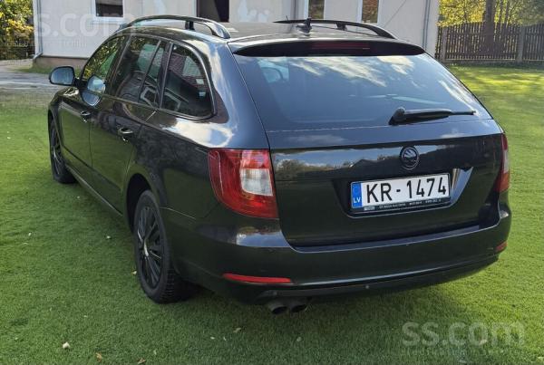 Black Skoda SuperB 2011 in Riga, with an engine capacity of 2.00 L and mileage of 379 thousand km for 4200 €, photo 4 on AUTOMOTO.COM.LV