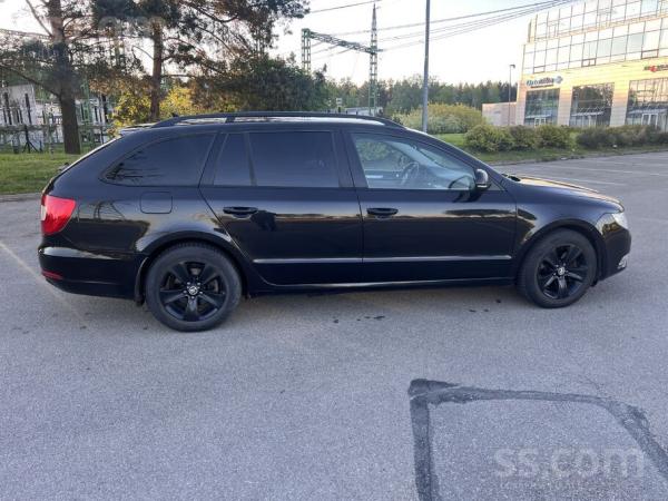 Black Skoda SuperB 2011 in Riga, with an engine capacity of 2.00 L and mileage of 389 thousand km for 3900 €, photo 2 on AUTOMOTO.COM.LV