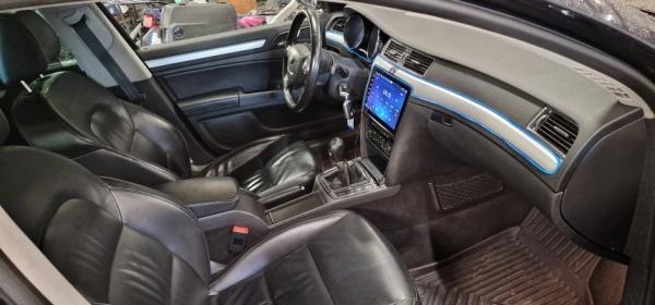 Black Skoda SuperB 2011 in Riga, with an engine capacity of 2.00 L and mileage of 395 thousand km for 4450 €, photo 9 on AUTOMOTO.COM.LV