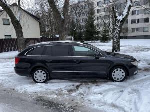 Black Skoda SuperB 2012 in Vilnius, with an engine capacity of 1.97 L and mileage of 180 thousand km for 3950 €, photo 10 on AUTOMOTO.COM.LV