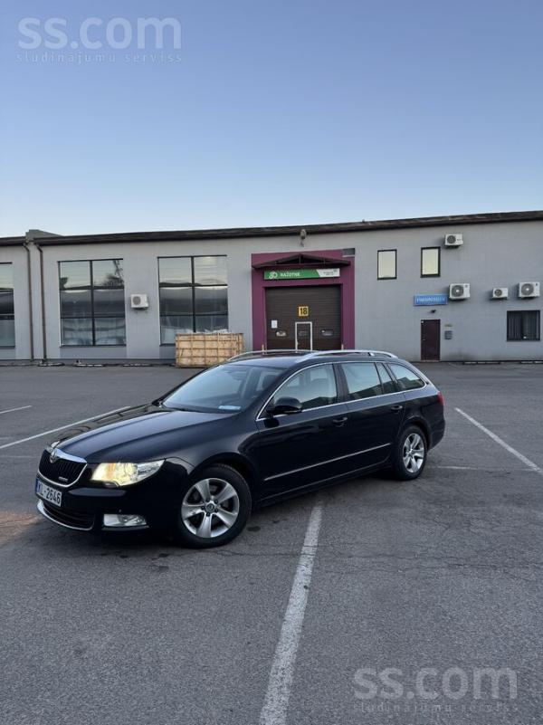 Black Skoda SuperB 2012 in Riga, with an engine capacity of 1.60 L and mileage of 241 thousand km for 5700 €, photo 2 on AUTOMOTO.COM.LV