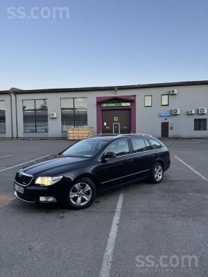 Black Skoda SuperB 2012 in Riga, with an engine capacity of 1.60 L and mileage of 241 thousand km for 5700 €, photo 2 on AUTOMOTO.COM.LV