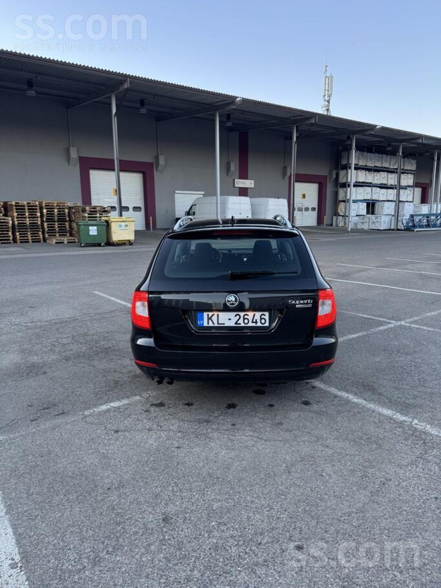 Black Skoda SuperB 2012 in Riga, with an engine capacity of 1.60 L and mileage of 241 thousand km for 5700 €, photo 3 on AUTOMOTO.COM.LV