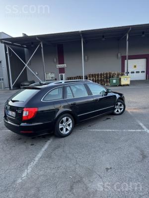 Black Skoda SuperB 2012 in Riga, with an engine capacity of 1.60 L and mileage of 241 thousand km for 5700 €, photo 4 on AUTOMOTO.COM.LV