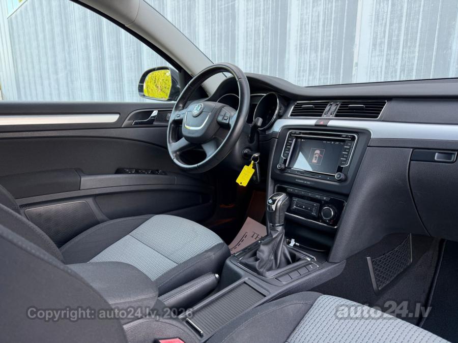 Black Skoda SuperB 2012 in Paide, with an engine capacity of 1.60 L and mileage of 230 thousand km for 6390 €, photo 12 on AUTOMOTO.COM.LV