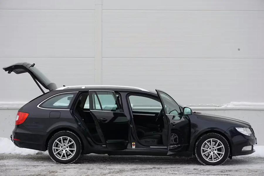 Black Skoda SuperB 2012 in Riga, with an engine capacity of 2.00 L and mileage of 238 thousand km for 6500 €, photo 14 on AUTOMOTO.COM.LV