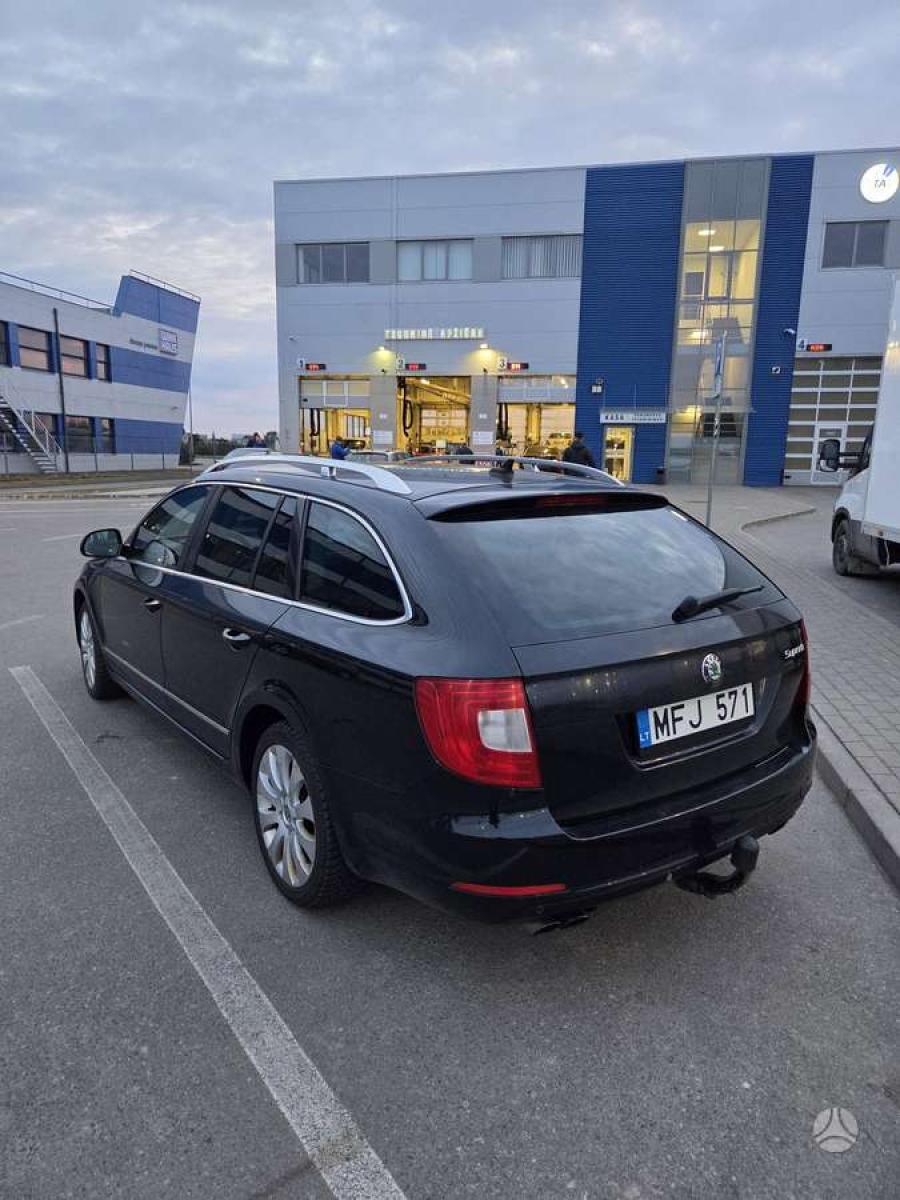 Black Skoda SuperB 2012 in Vilnius, with an engine capacity of 1.98 L and mileage of 313 thousand km for 6300 €, photo 6 on AUTOMOTO.COM.LV