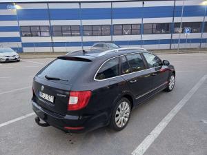 Black Skoda SuperB 2012 in Vilnius, with an engine capacity of 1.98 L and mileage of 313 thousand km for 6300 €, photo 8 on AUTOMOTO.COM.LV
