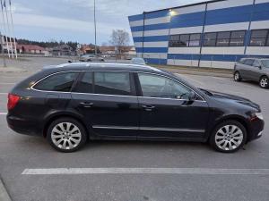 Black Skoda SuperB 2012 in Vilnius, with an engine capacity of 1.98 L and mileage of 313 thousand km for 6300 €, photo 9 on AUTOMOTO.COM.LV