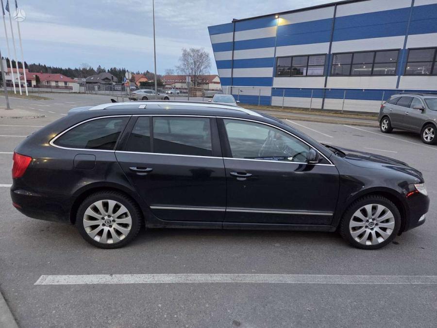 Black Skoda SuperB 2012 in Vilnius, with an engine capacity of 1.98 L and mileage of 313 thousand km for 6300 €, photo 9 on AUTOMOTO.COM.LV