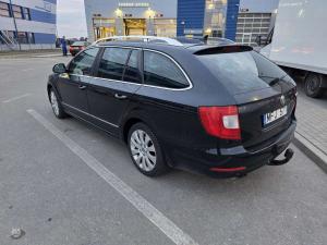 Black Skoda SuperB 2012 in Vilnius, with an engine capacity of 1.98 L and mileage of 313 thousand km for 6300 €, photo 12 on AUTOMOTO.COM.LV