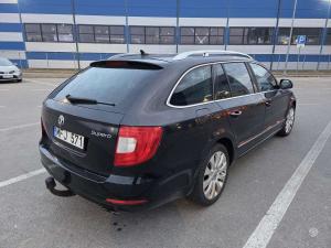 Black Skoda SuperB 2012 in Vilnius, with an engine capacity of 1.98 L and mileage of 313 thousand km for 6300 €, photo 13 on AUTOMOTO.COM.LV