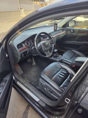 Black Skoda SuperB 2012 in Vilnius, with an engine capacity of 1.98 L and mileage of 313 thousand km for 6300 €, photo 16 on AUTOMOTO.COM.LV