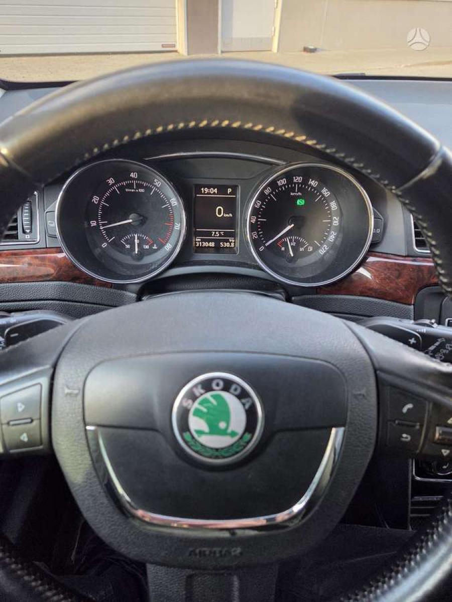 Black Skoda SuperB 2012 in Vilnius, with an engine capacity of 1.98 L and mileage of 313 thousand km for 6300 €, photo 17 on AUTOMOTO.COM.LV