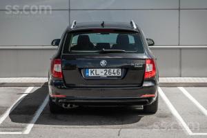 Black Skoda SuperB 2012 in Riga, with an engine capacity of 1.60 L and mileage of 242 thousand km for 5250 €, photo 6 on AUTOMOTO.COM.LV