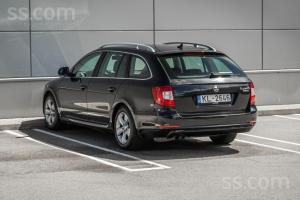 Black Skoda SuperB 2012 in Riga, with an engine capacity of 1.60 L and mileage of 242 thousand km for 5250 €, photo 7 on AUTOMOTO.COM.LV