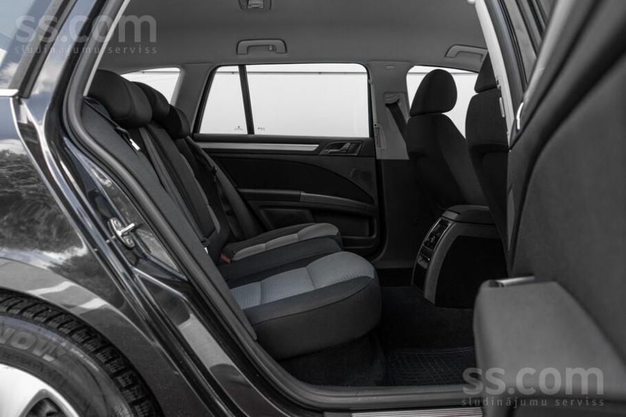 Black Skoda SuperB 2012 in Riga, with an engine capacity of 1.60 L and mileage of 242 thousand km for 5250 €, photo 12 on AUTOMOTO.COM.LV